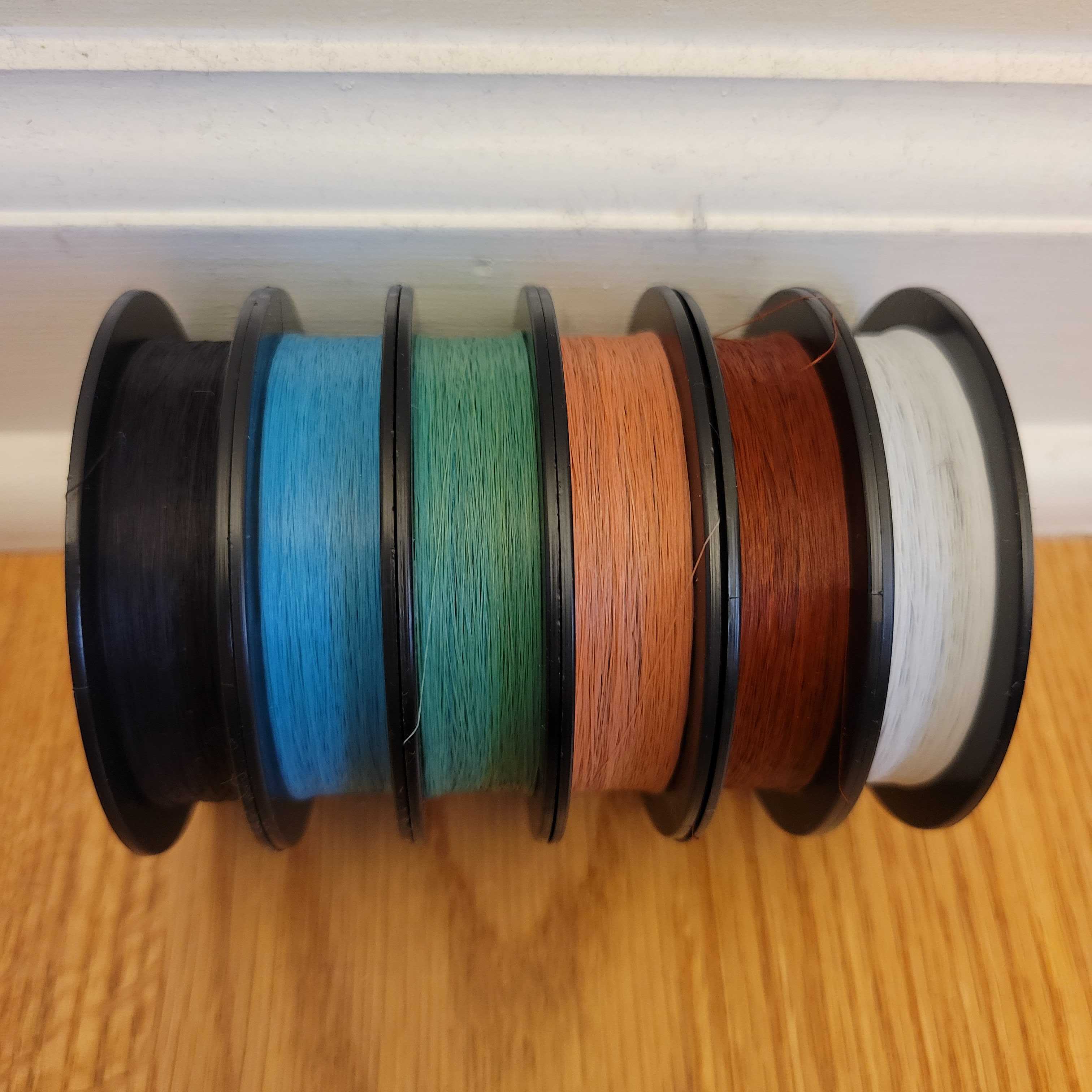 .003 fine green elastic polymer telephone utility wire