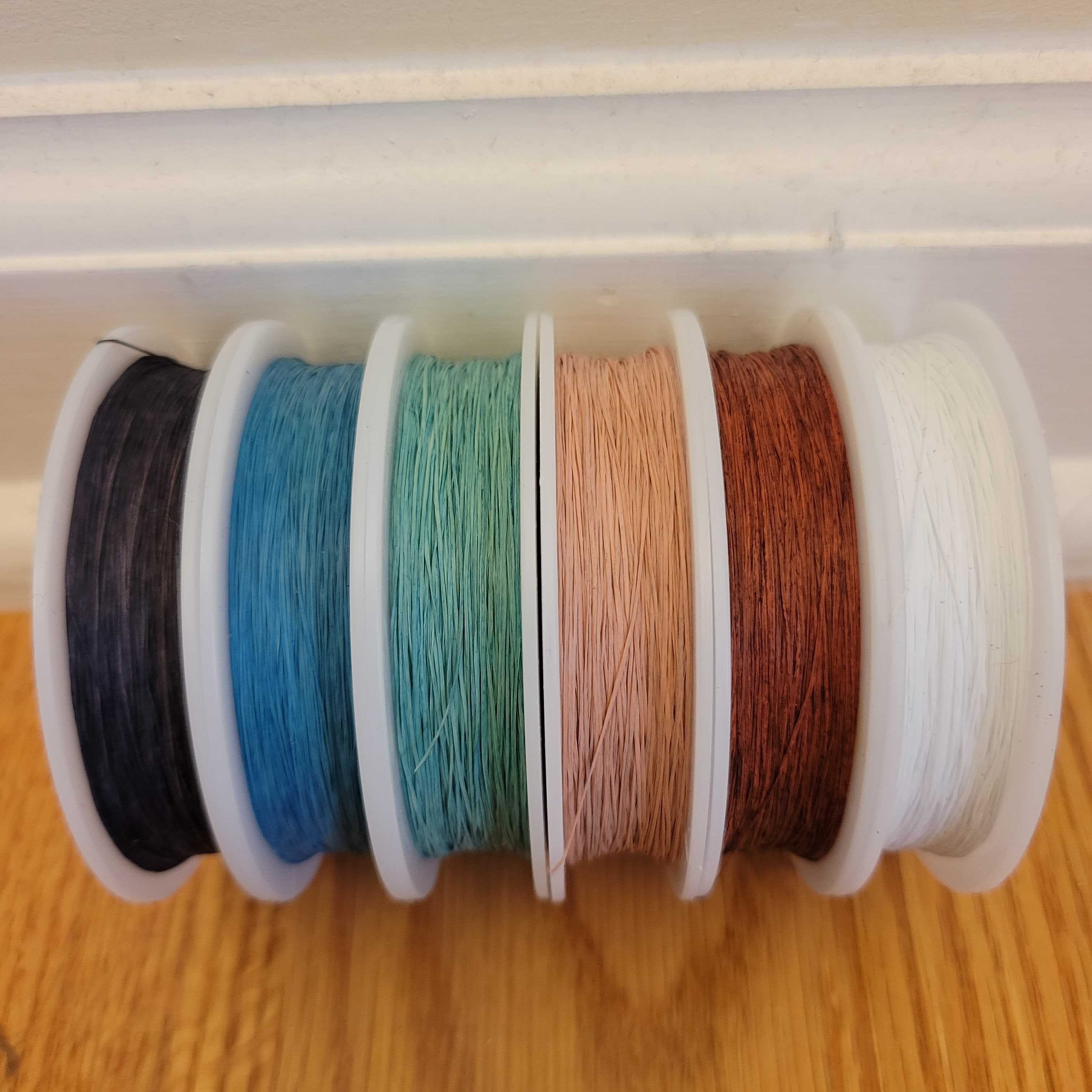 .006 heavy white elastic polymer telephone utility wire